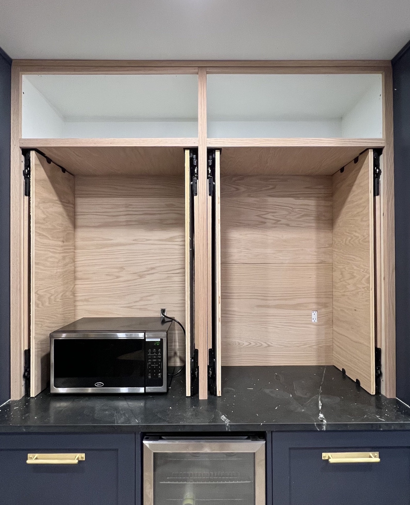 DIY Cabinet with Pocket Doors - findmaggiemay.com