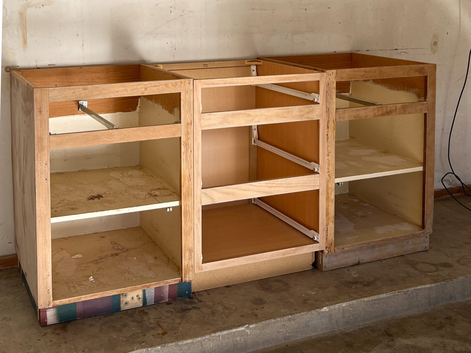 Turning trash into a Workbench Cabinet - findmaggiemay.com